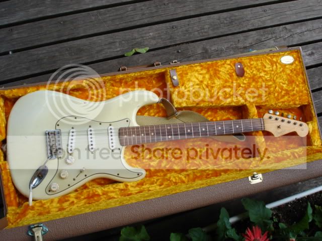 Show me your Olympic White Strats with different colored pickguards ...